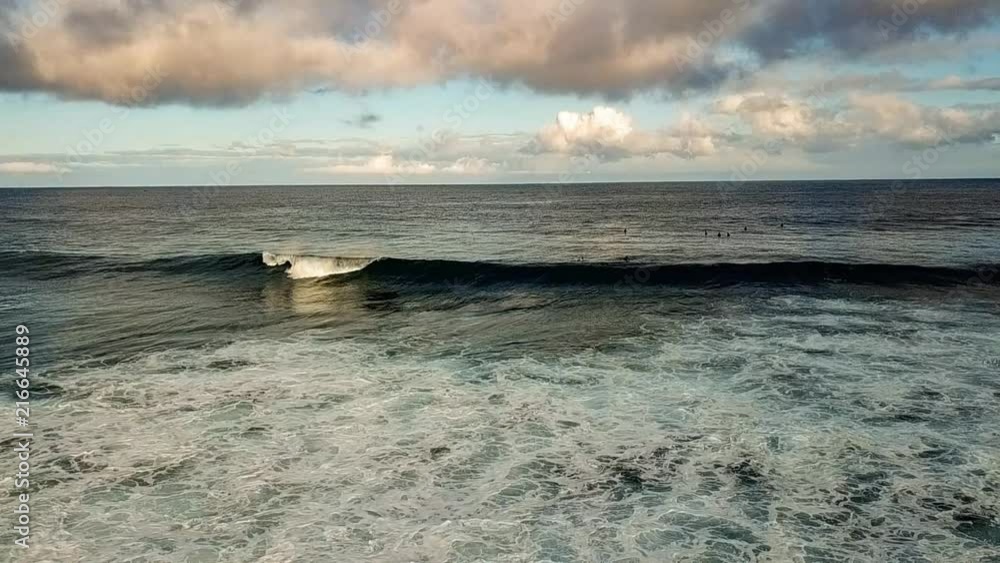 surf spot with men surfers and waves from ocean power. vacation scenic place perfect for water ...