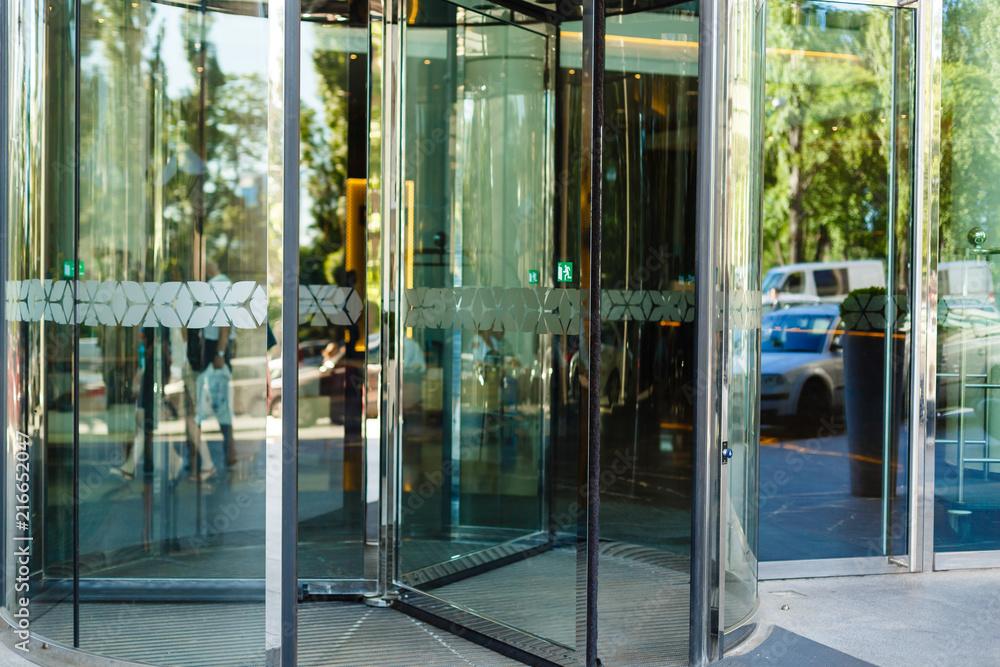 Revolving door in reception of office building Stock Photo | Adobe Stock