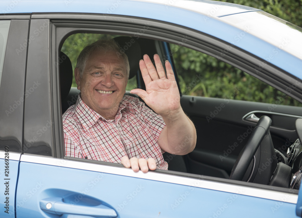 People Waving From Car