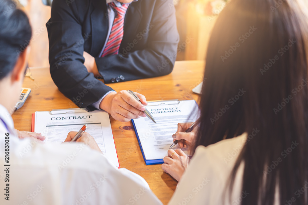 Husband and wife are signing divorce contract agreement.Contract ...