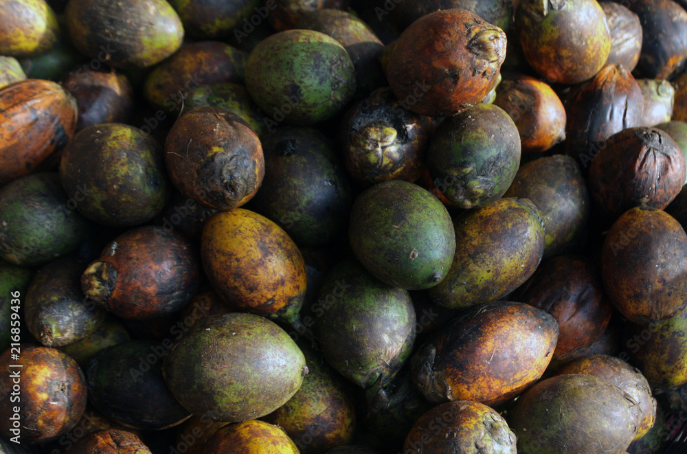Areca nut aka betel nut at a market for sale. Paan is sold in ready-to ...