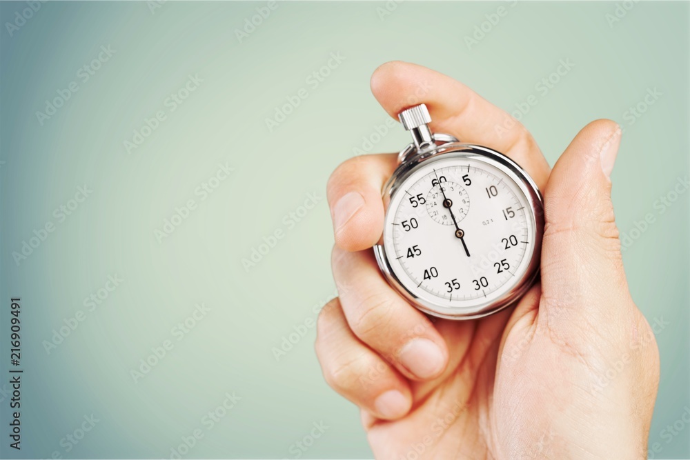 Stopwatch in Human Hand, Timer Stock Photo | Adobe Stock