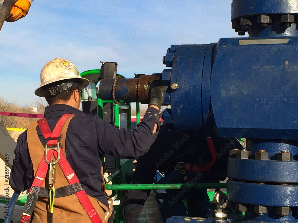 Men Working In the Oilfield Stock Photo | Adobe Stock