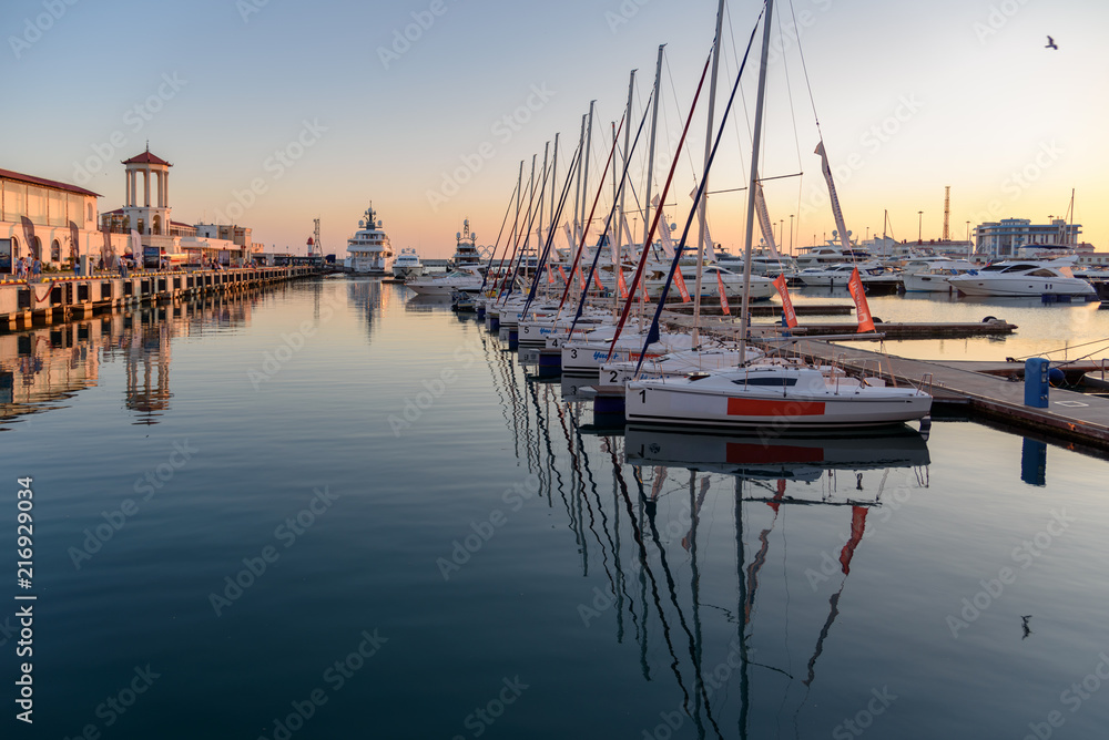Yachts, boats, ships, vessels in the harbor of Seaport pf Sochi, Russia ...