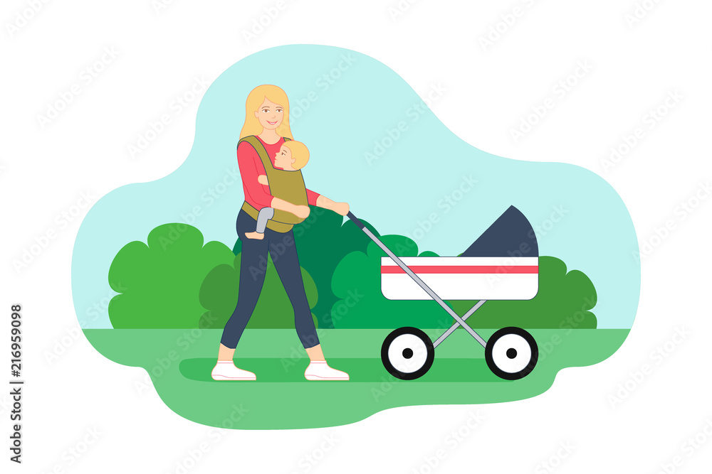Young mother is walking in the park with her little baby in ergo ...