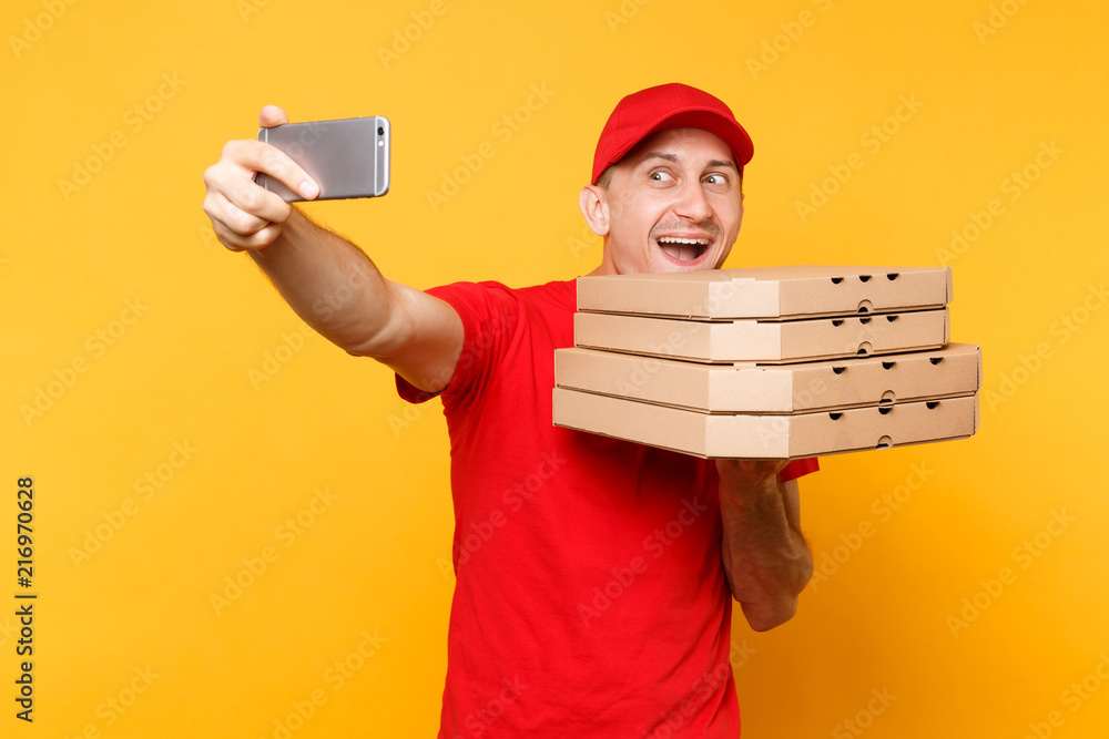 Delivery man in red cap t-shirt giving food order italian pizza in ...
