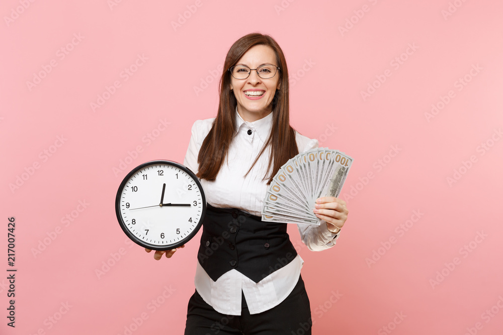 Young smiling business woman in suit glasses holding bundle lots of ...