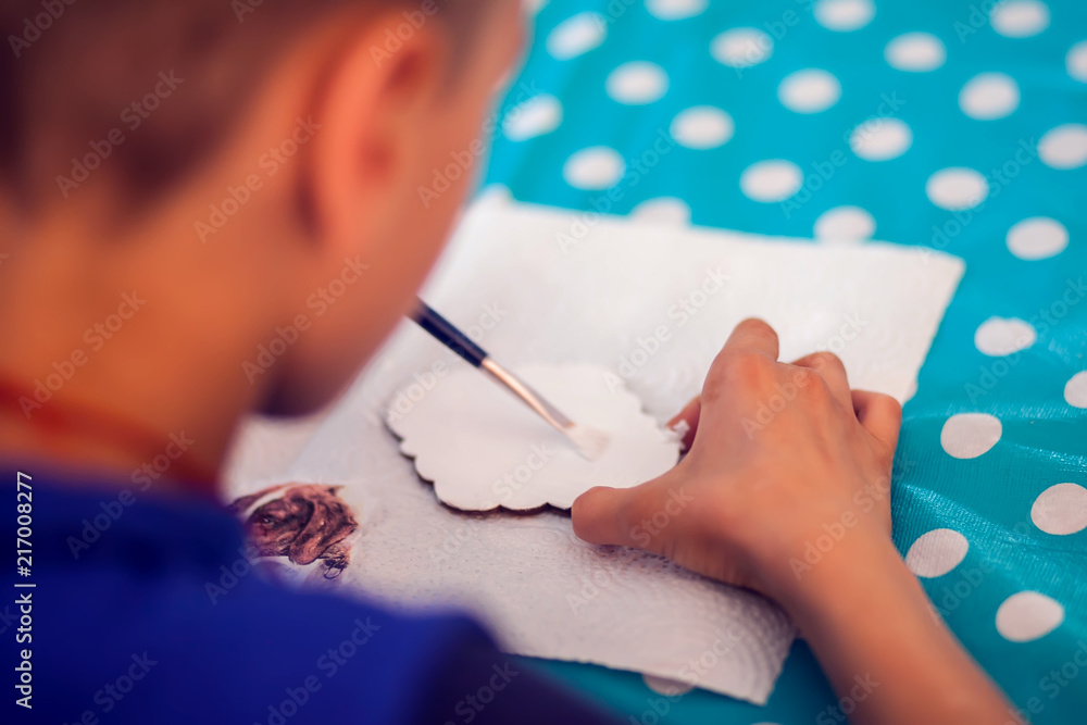 Children hands making artworks with wood and paint crafts. workplace ...