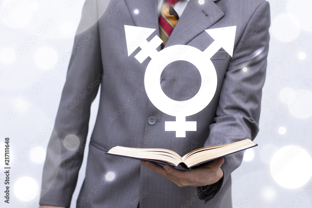 Transgender Learning concept. Young man holds book with transgender ...