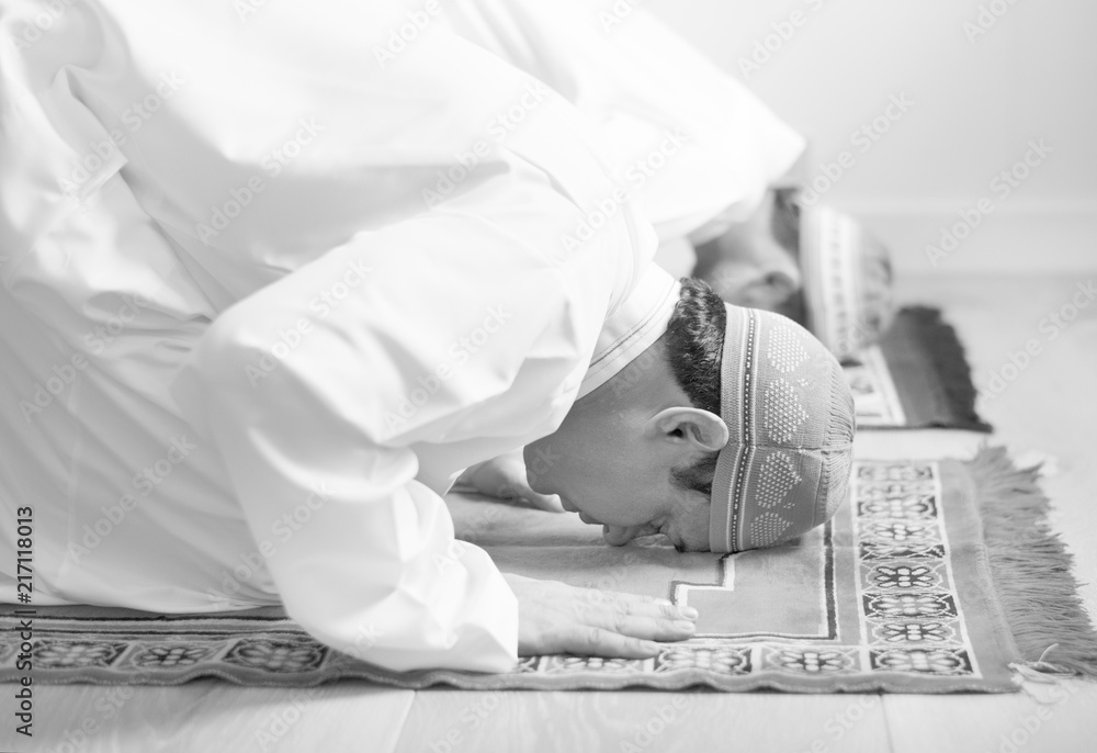 Muslim praying in Sujud posture Stock Photo | Adobe Stock