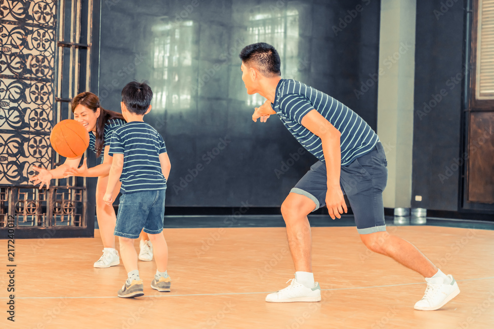 Happy family playing basketball. Stock Photo | Adobe Stock
