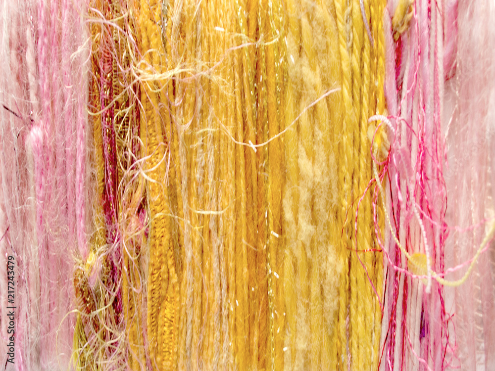 Vertical striped background composed of varying colors and textures of ...