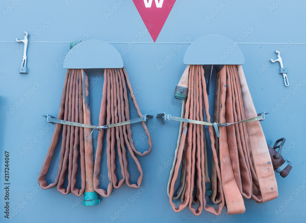 Rescue fire truck equipment.Fire hose reel in ship.rolled up fire hoses ...