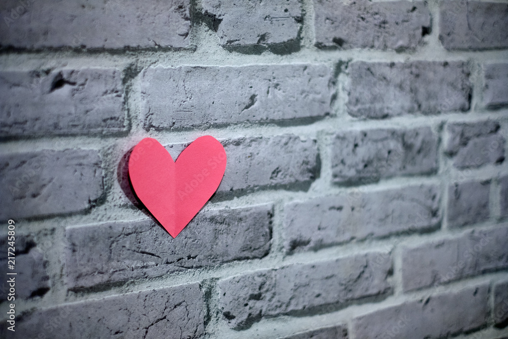 Gray brick wall with mini heart build by wallpaper and paper hanging on ...