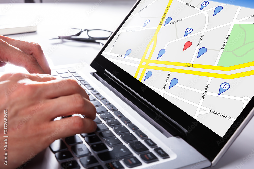 Fotografia do Stock: Person Using Gps Map On Laptop | Adobe Stock