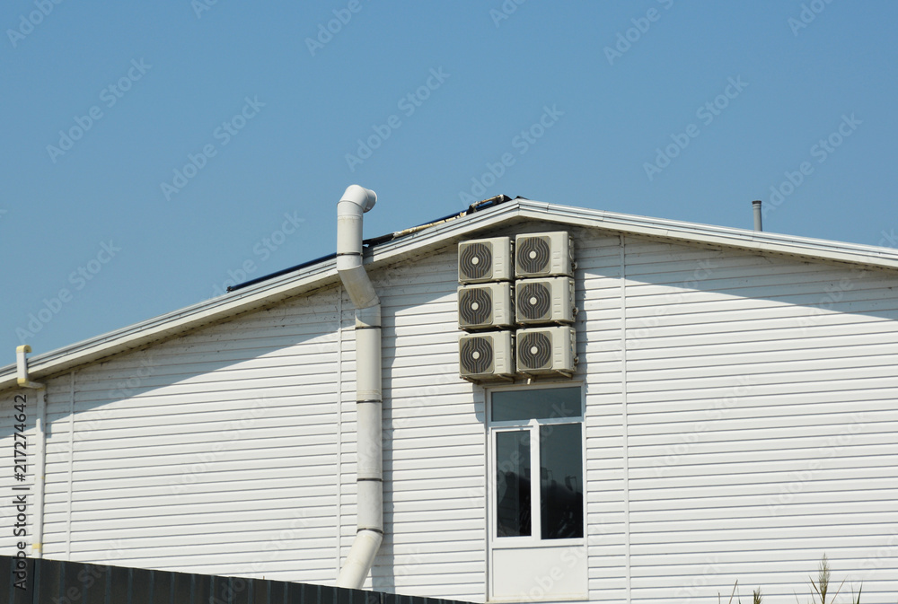 Ventilation systen on siding house construction with air compresors and ...