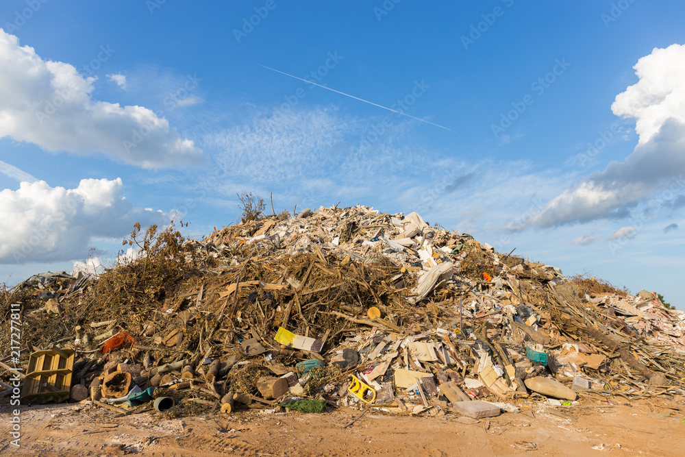 Three-story-high storm debris piles following devastating hurricane ...