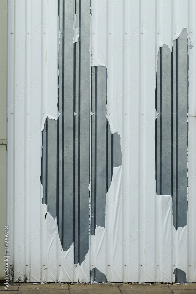 External cladding coating dis bonding and flaking off exposing the ...