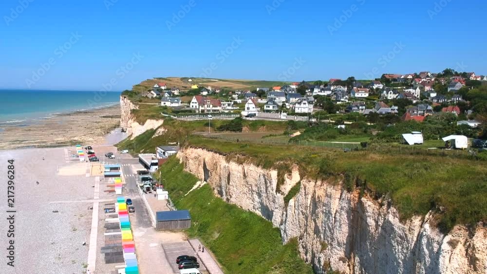 Drone footage of the beach huts, tide pools, the beach & the cliffs of ...