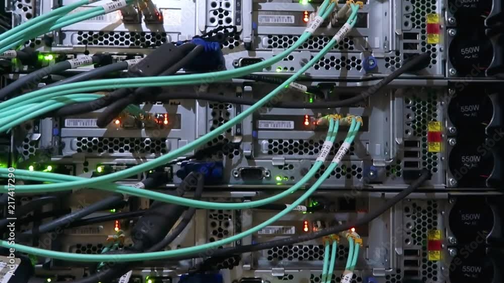 Back panel of powerful servers installed in the rack of the server room ...