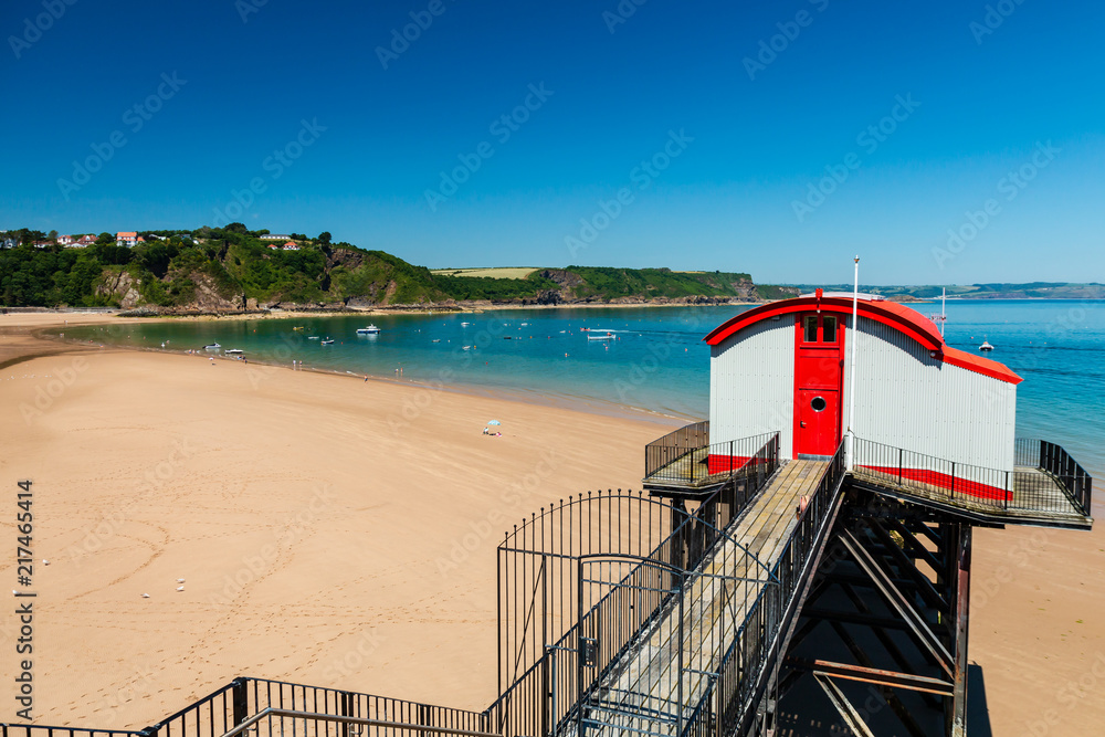 The main beach and lifeboat stations at the ancient West Wales walled ...