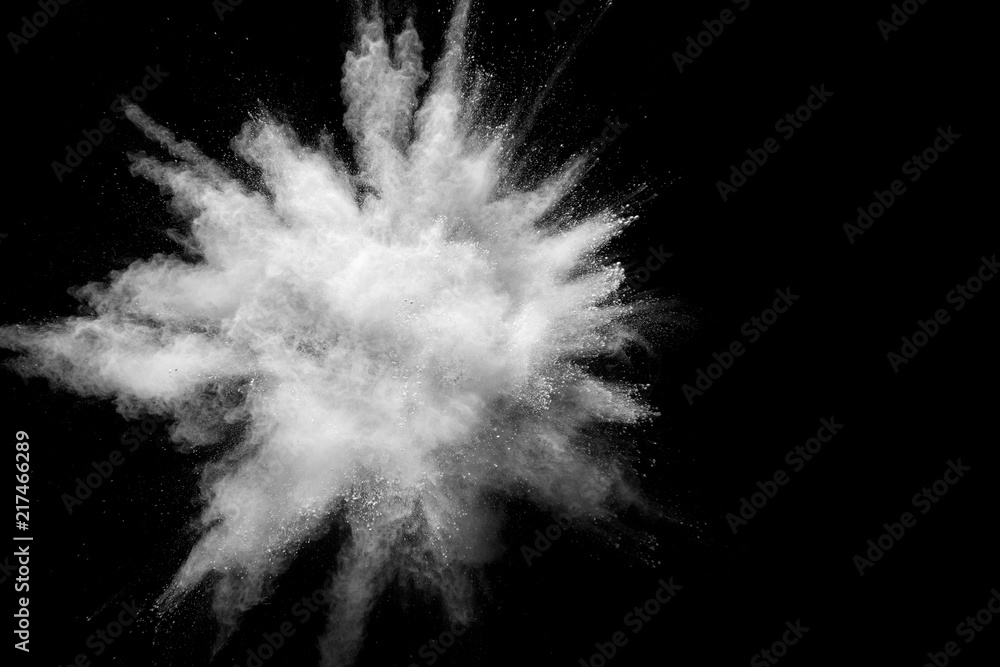Bizarre forms of white powder explosion cloud against black background ...