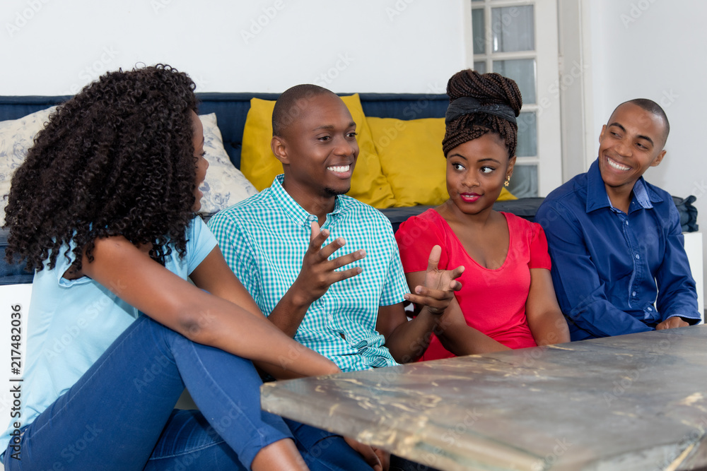 Happy african american people talking about sports and politics Stock ...