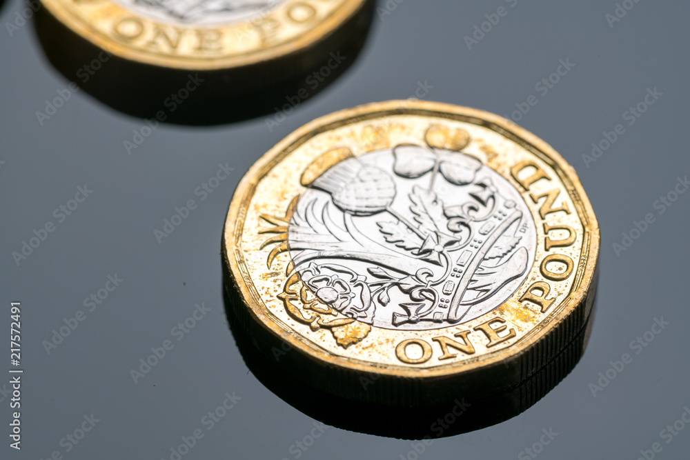 New British one pound coin in studio Stock Photo | Adobe Stock