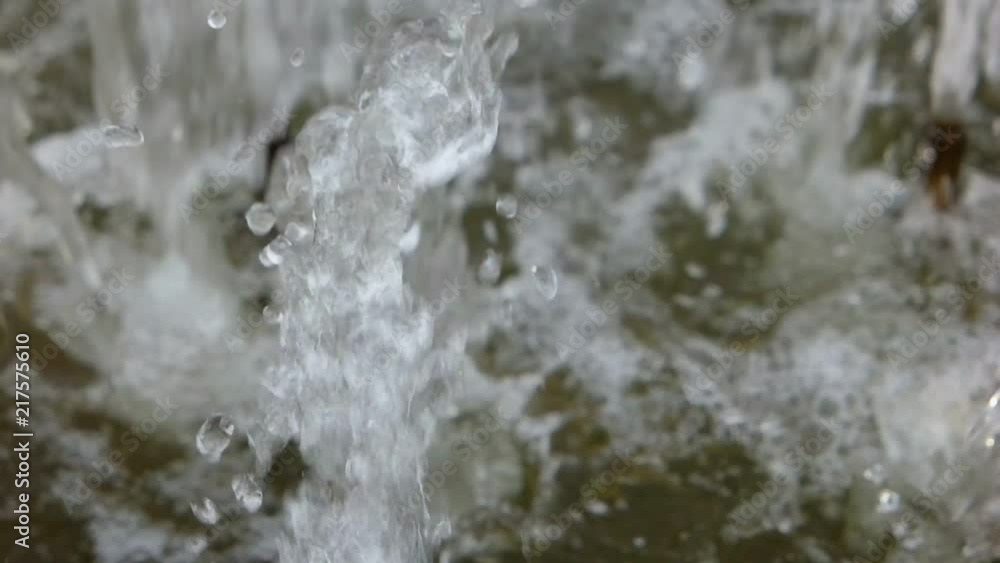 Large drops of water levitate in air, slomo of fountain working Stock ...