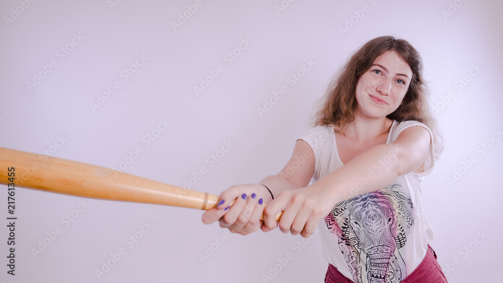 Young cute girl with baseball bat, Girl with a bat. girl or criminal ...