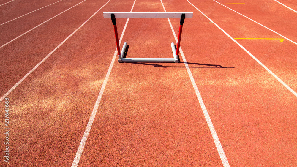 hurdle race barrier on red running track , athletic stadium Stock Photo ...