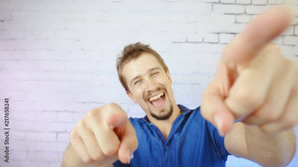 Vidéo Stock Man mocking you in slow motion 4K. Portrait of a male ...