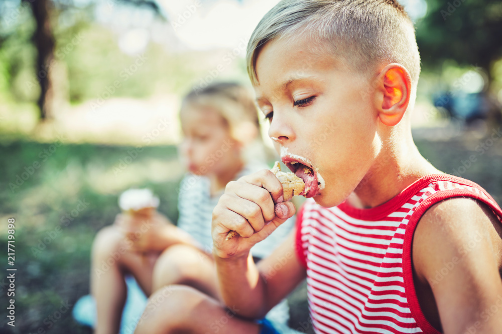 Kids eating ice cream on hot summer day on tropical vacation. Stock ...