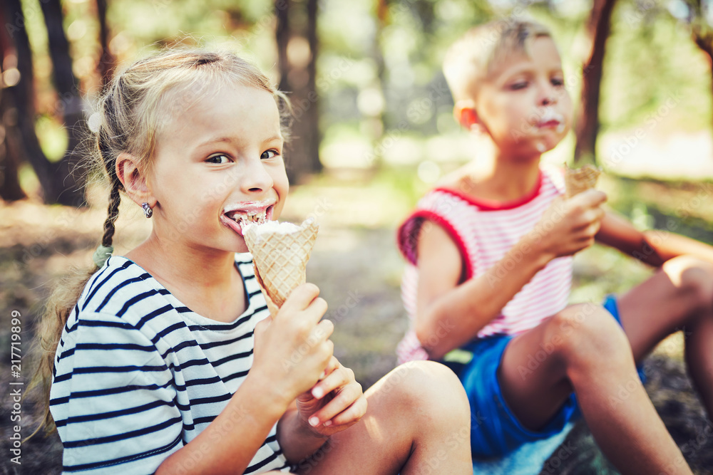Kids eating ice cream on hot summer day on tropical vacation. Stock ...