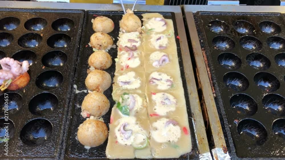 Cooking ball-shaped on street food dumpling fried snack dish with big ...