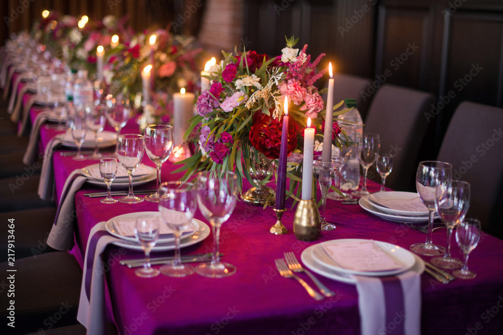 Elegant Dark Pink Wedding Banquet Table With Glasses Dishes And