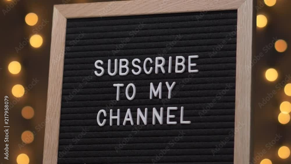 Black letter board with SUBSCRIBE TO MY CHANNEL Written on it with ...