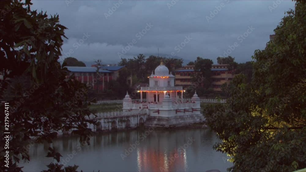 Rani Pokhari, meaning Queen's Pond, at dusk. A historic artificial pond ...