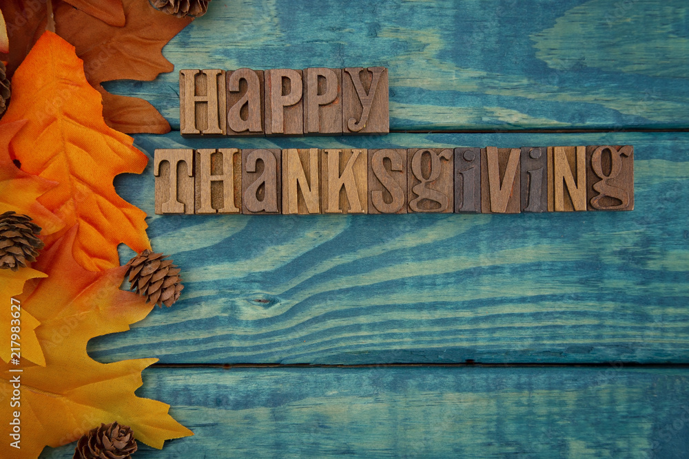 Happy Thanksgiving Background with Fall Leaves on Blue Wood Stock Photo ...