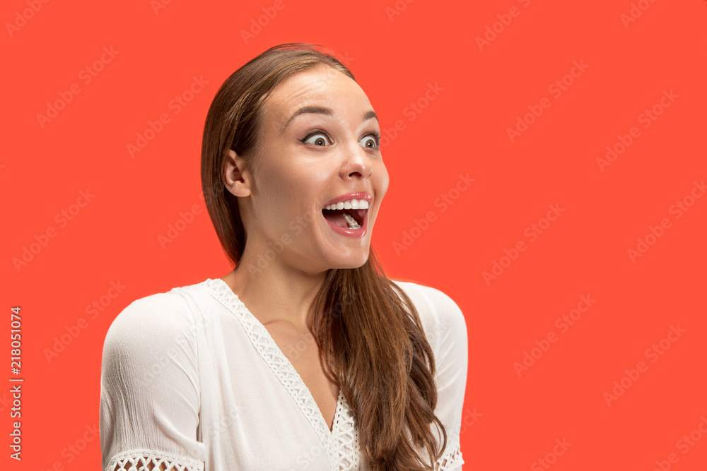 Delight. Beautiful female half-length front portrait isolated on red ...