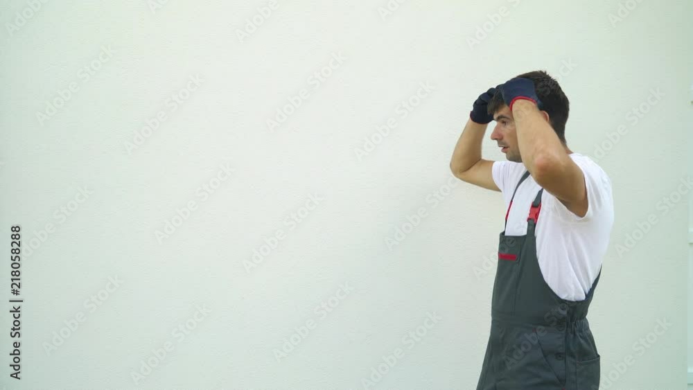 Portrait male industrial worker isolated gesturing hopeless. Hands over ...