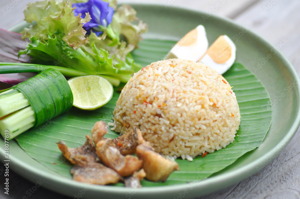 stir-fried rice with fried fish and egg Stock Photo | Adobe Stock