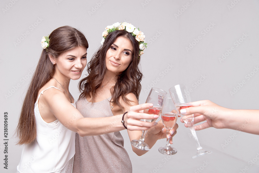 Girls having fun toasting with glasses of champagne. Stock Photo ...