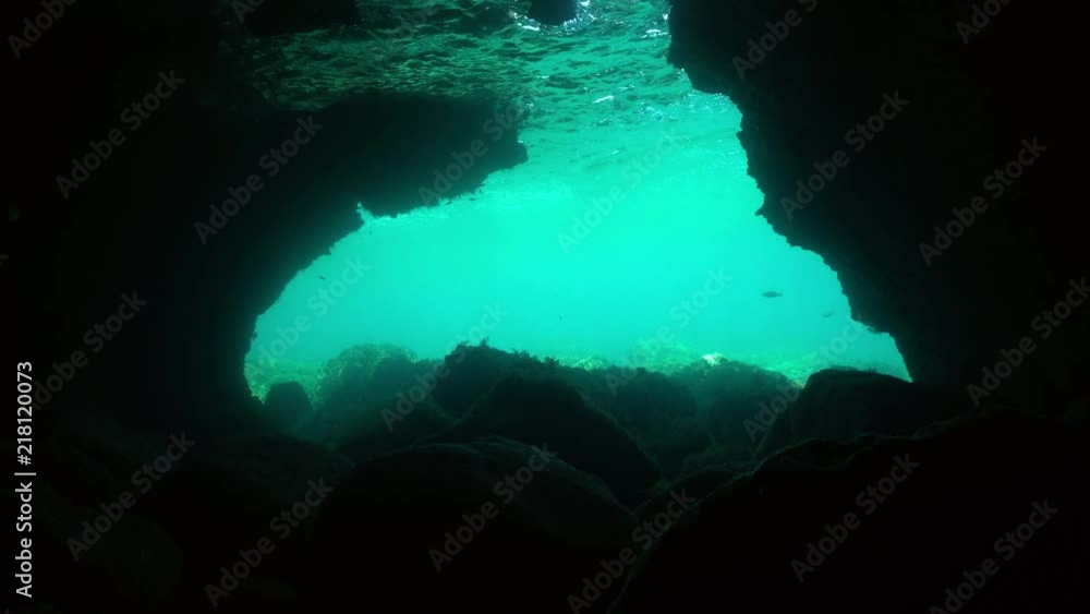 Exit of a shallow underwater cave in the Mediterranean sea, Catalonia ...
