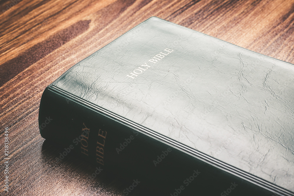 Holy Bible On The Desk Stock Photo | Adobe Stock