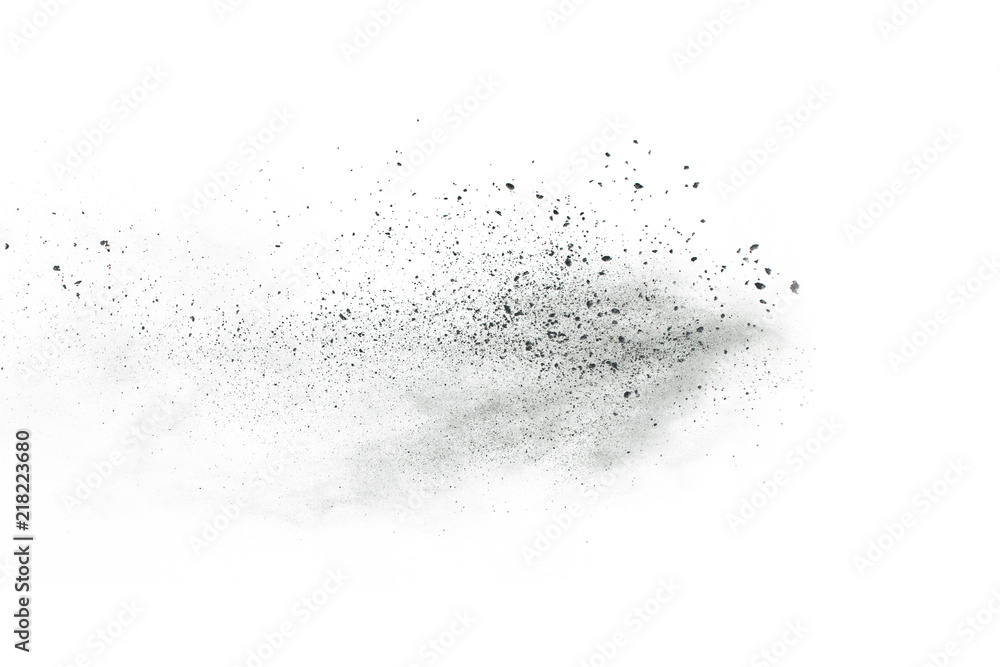 Black powder explosion. Closeup of black dust particles explode ...