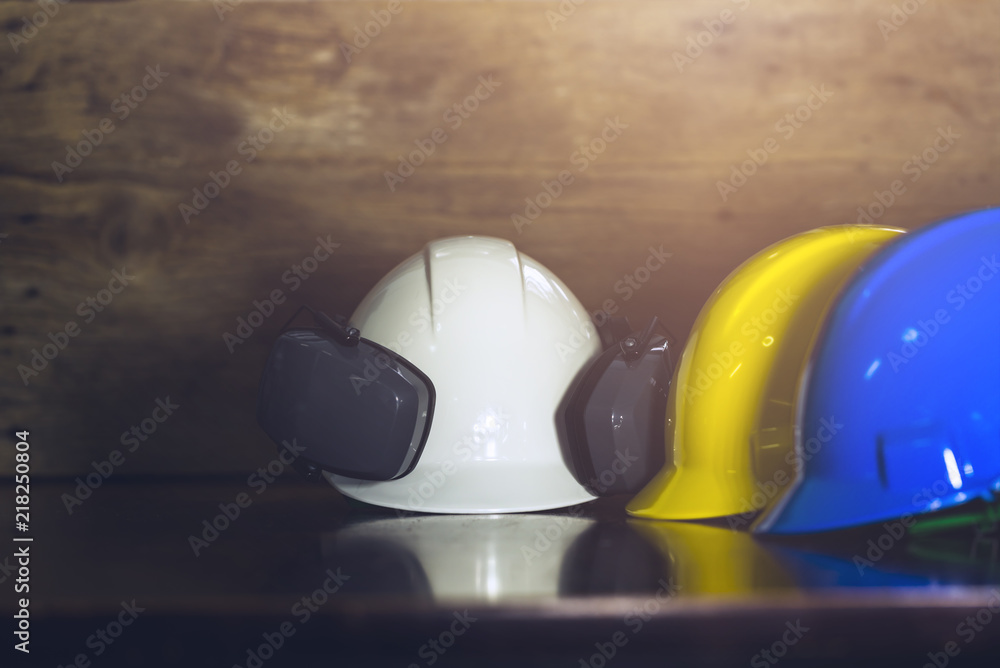 Engineer, electrician and worker 's helmet color as White, Blue and ...