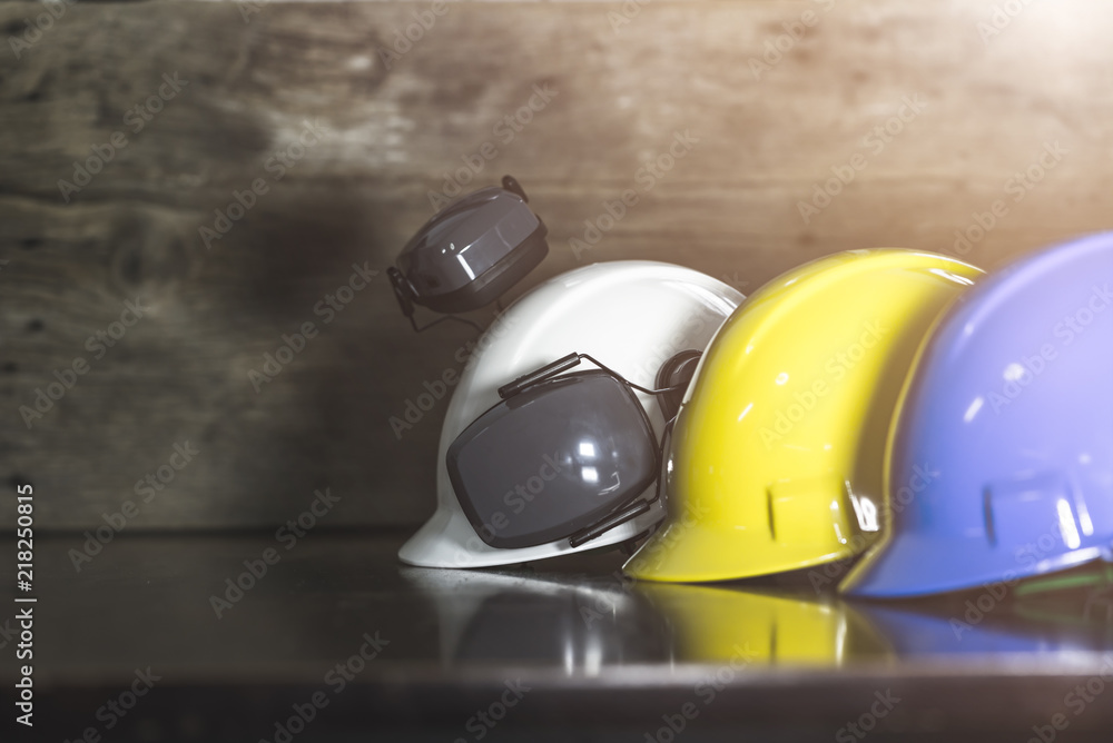 Engineer, electrician and worker 's helmet color as White, Blue and ...