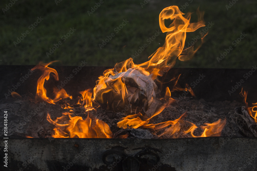 Flaming fire. Documents burning. Dance of fire spirits. Ignition of ...