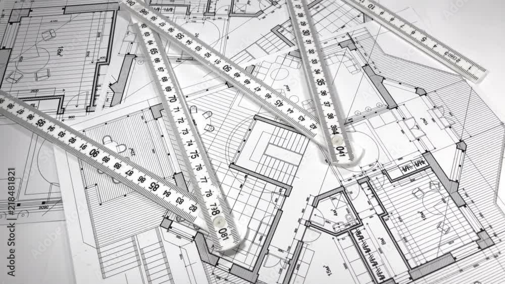 Blueprints: architectural drawings and yardstick - folding ruler ...